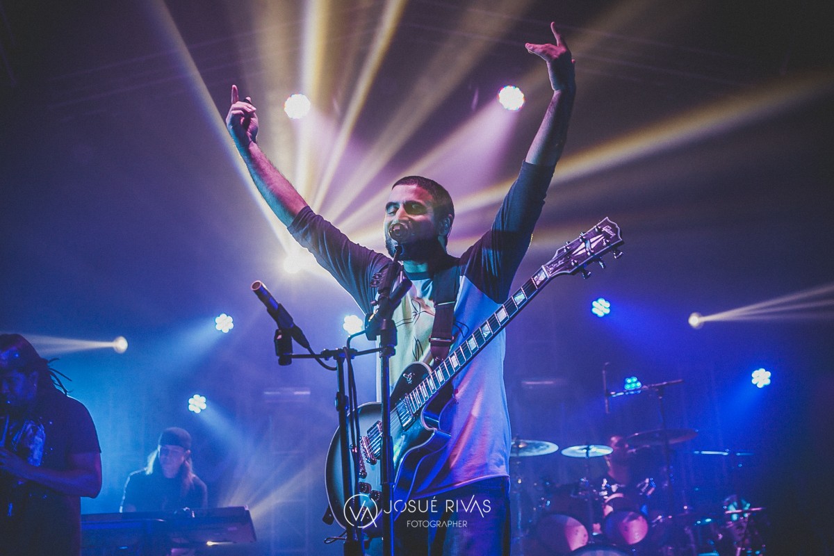 Eric Rachmany raises his hands | Rootfire